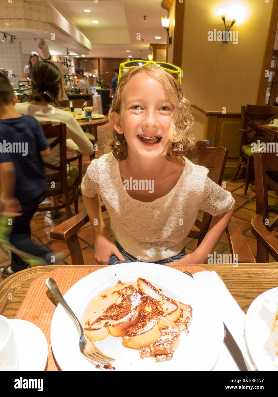 Family Fun in Montreal, Quebec, Canada. Girl smiling during meal Stock ...