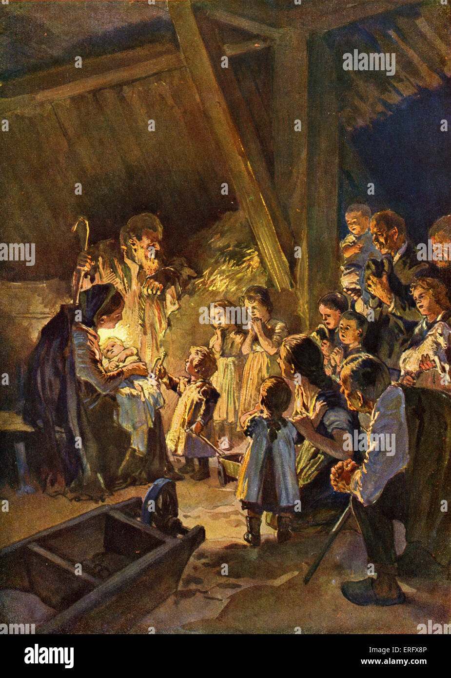German Christmas scene with children looking at the nativity scene in a ...
