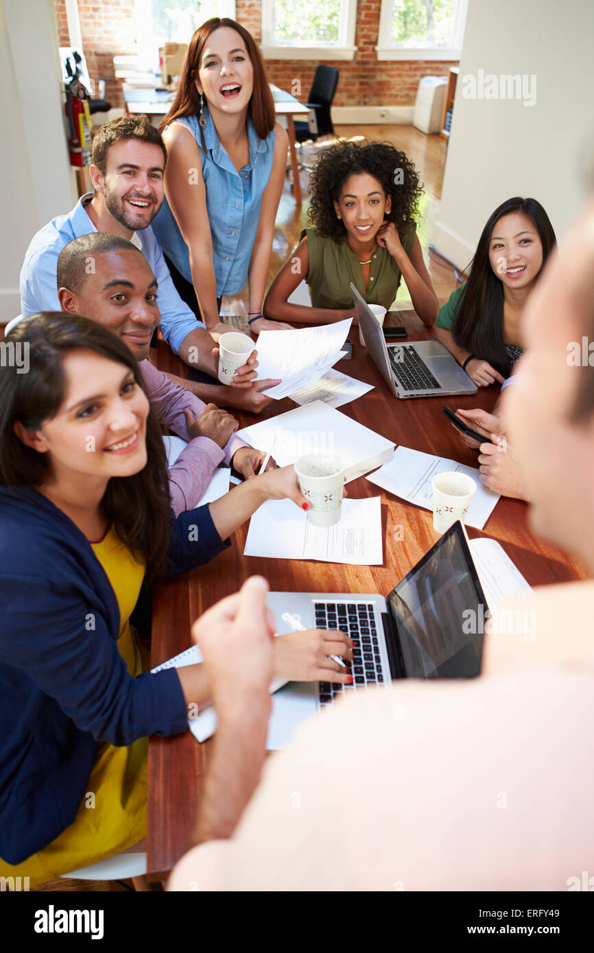 Group Of Office Workers Meeting To Discuss Ideas Stock Photo - Alamy