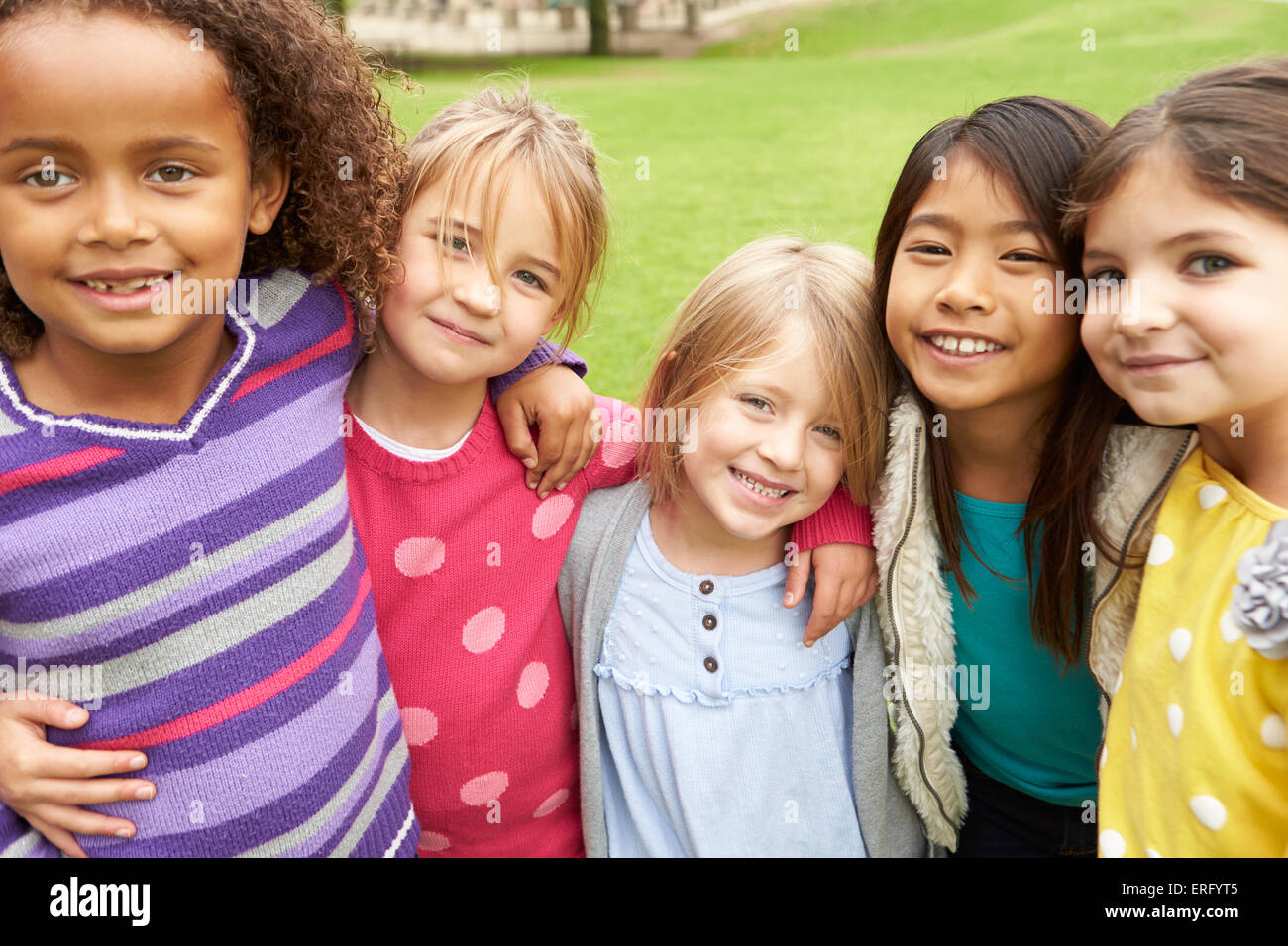 Group Of Young Girls Hanging Out In Park Together Stock Photo - Alamy