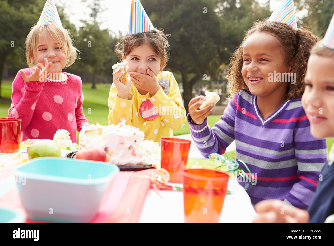 Group Of Children Having Outdoor Birthday Party Stock Photo - Alamy