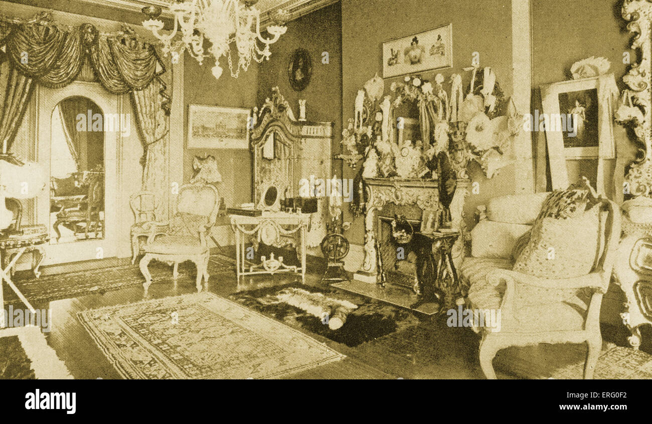 Luxurious interior from the 1890s. Caption reads: 'A sitting room in a ...