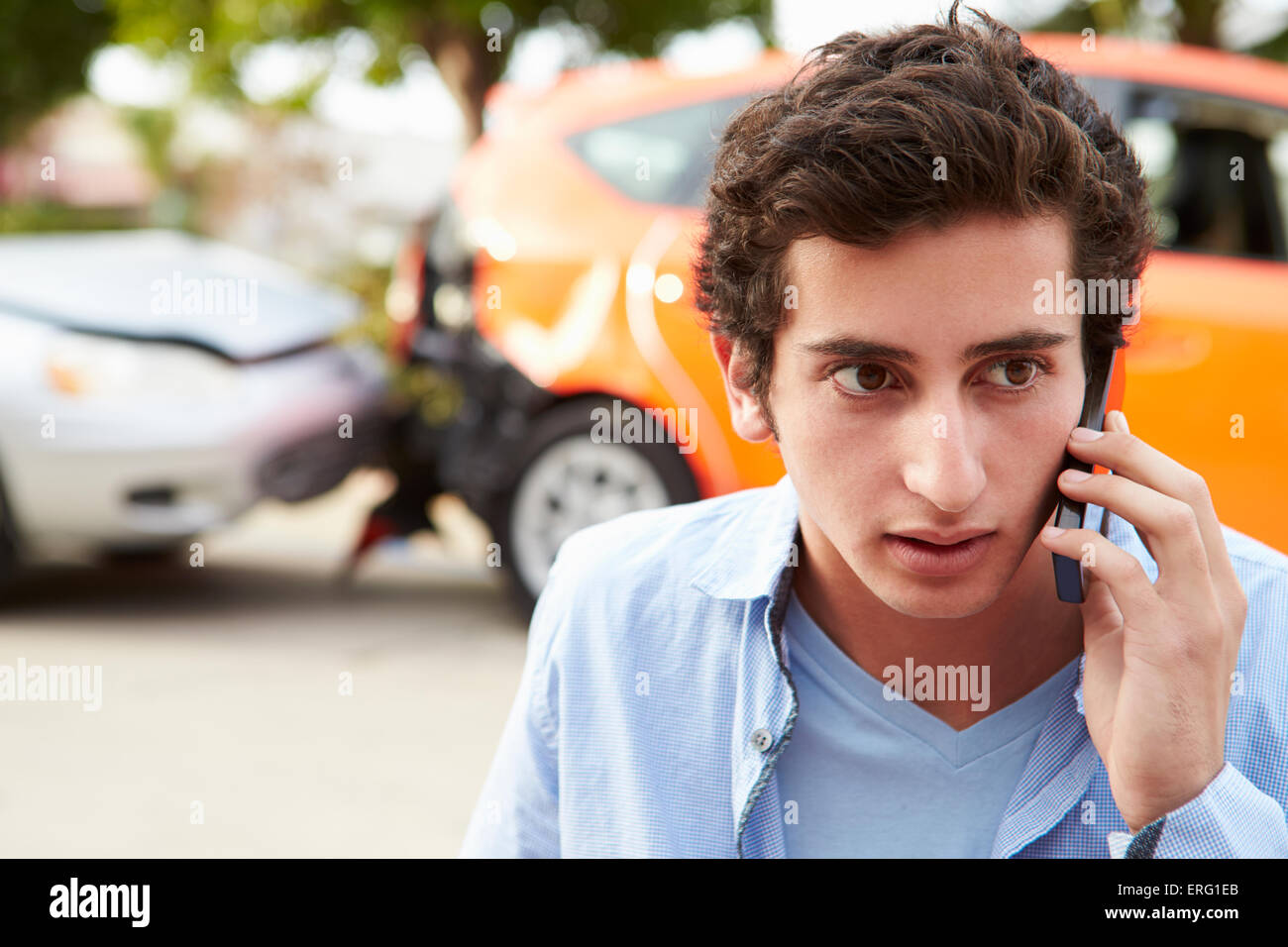 Teenage Driver Making Phone Call After Traffic Accident Stock Photo - Alamy