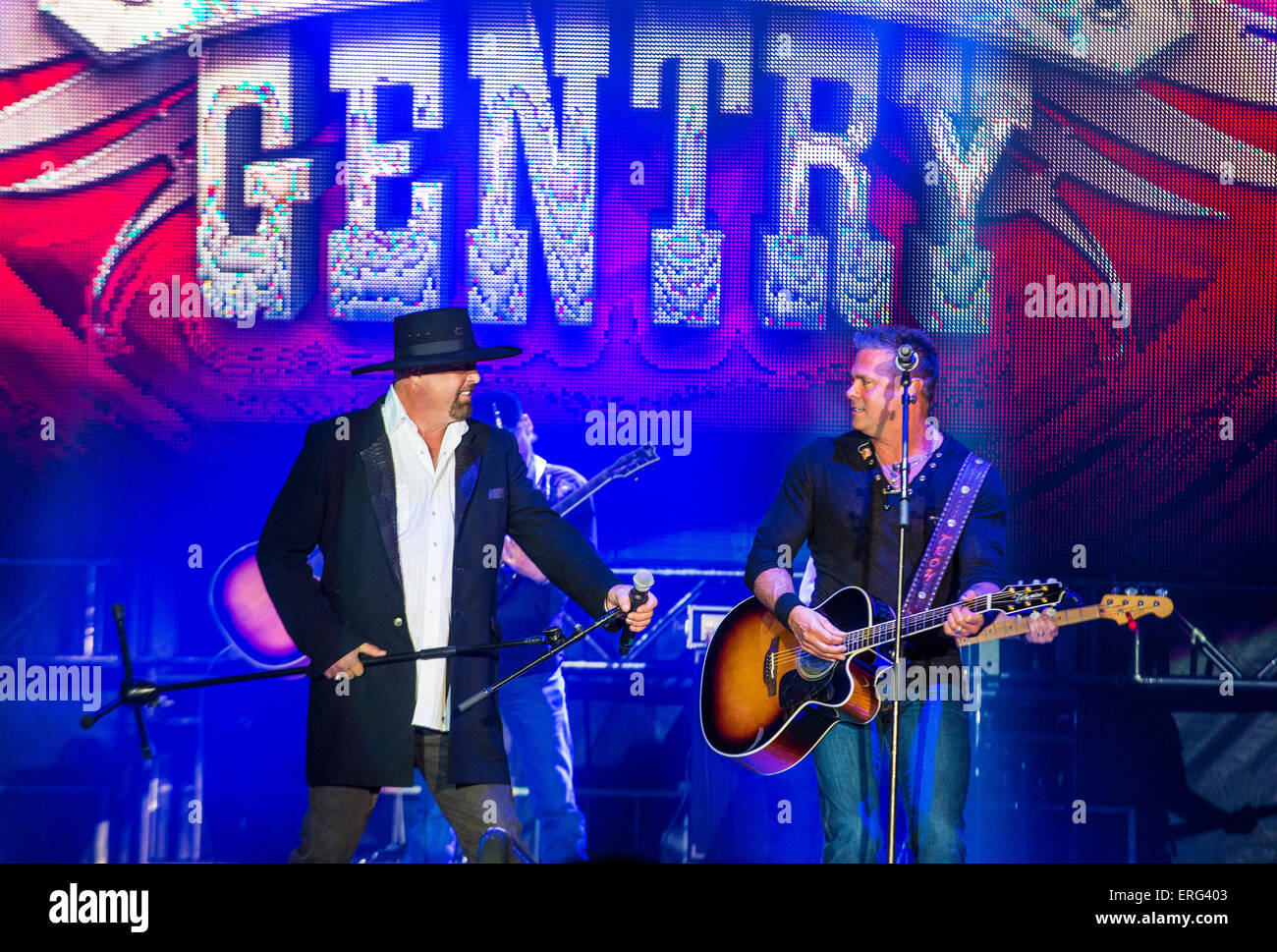 Eddie Montgomery and Troy Gentry of Montgomery Gentry perform on stage ...