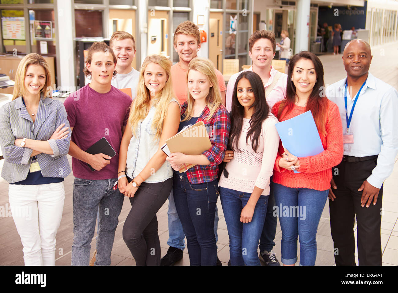 Group Portrait Of College Students With Tutor Stock Photo - Alamy