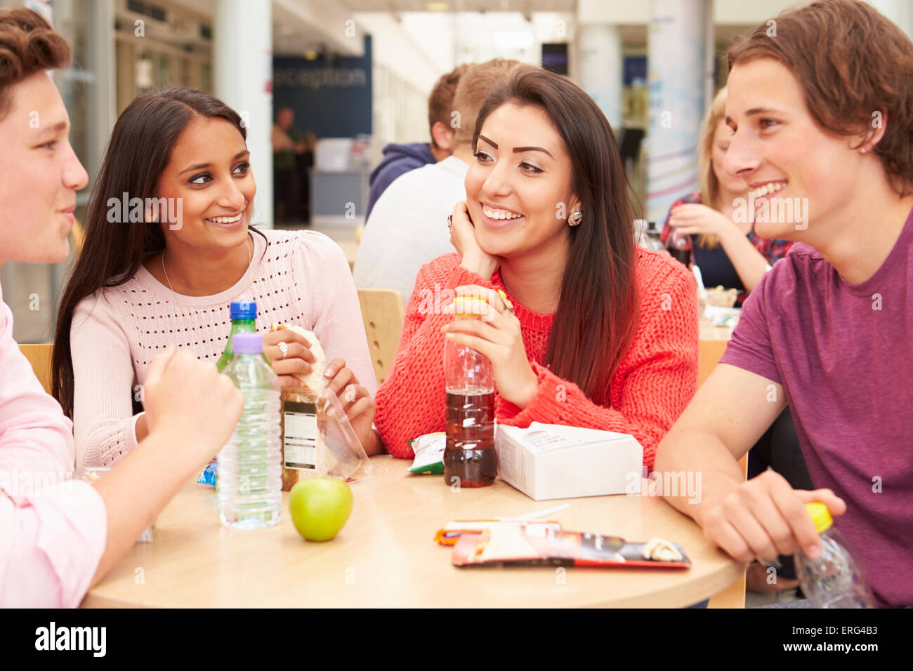 Group Of College Students Eating Lunch Together Stock Photo - Alamy