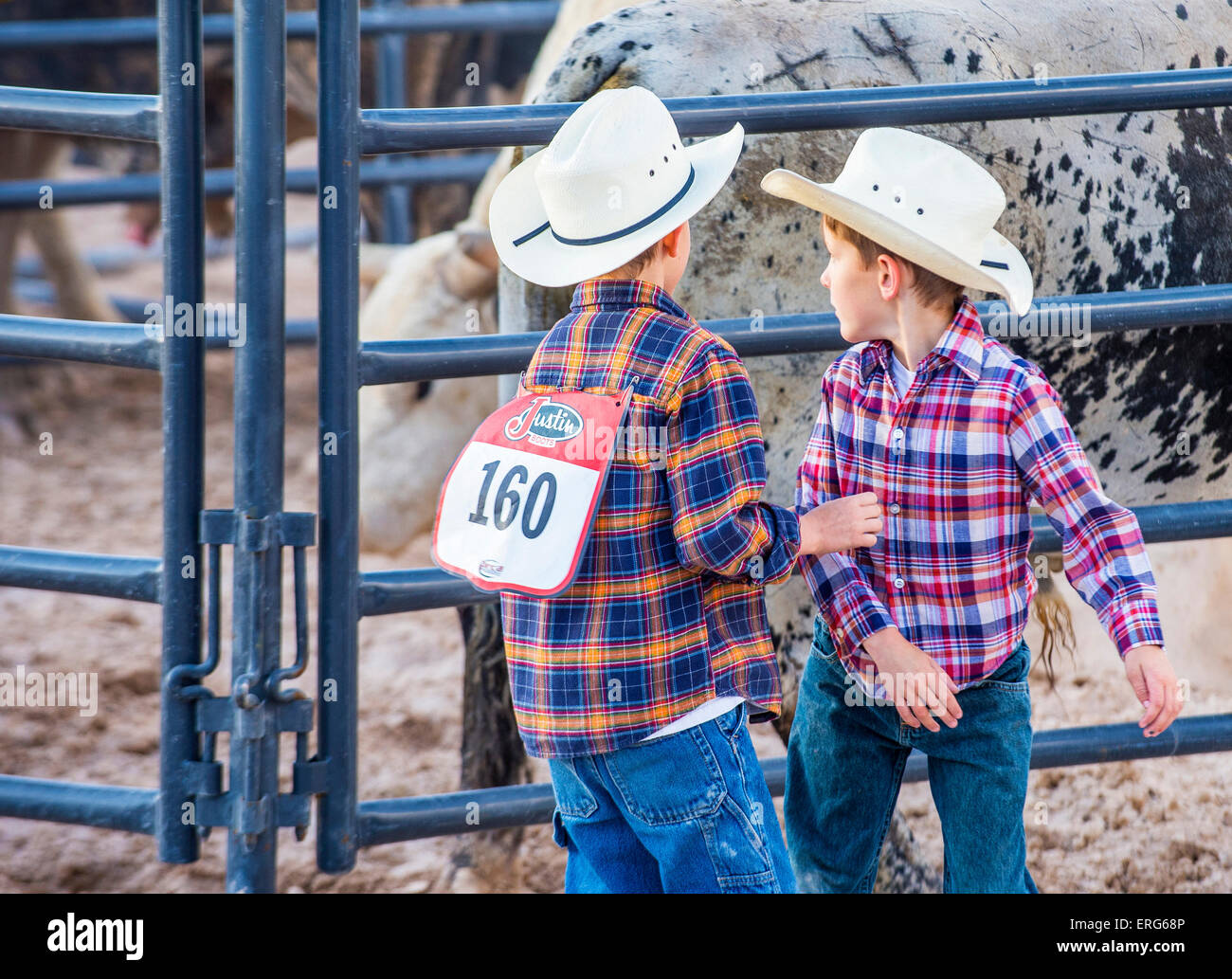 Two young cowboys riding hi-res stock photography and images - Alamy