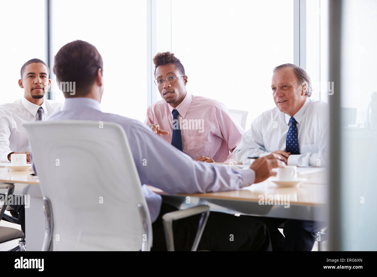 Seniors working around table hi-res stock photography and images - Alamy