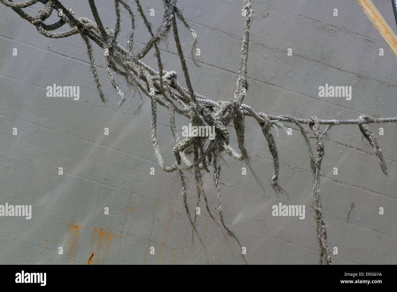 Tattered Rope on a Boat Hull Stock Photo - Alamy