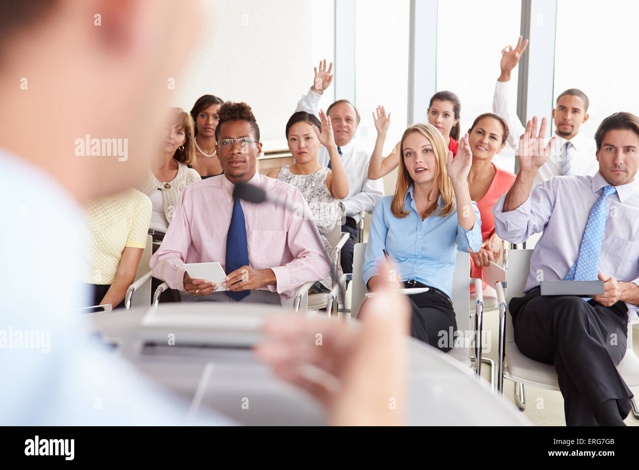 Delegates Asking Question At Business Conference Stock Photo - Alamy