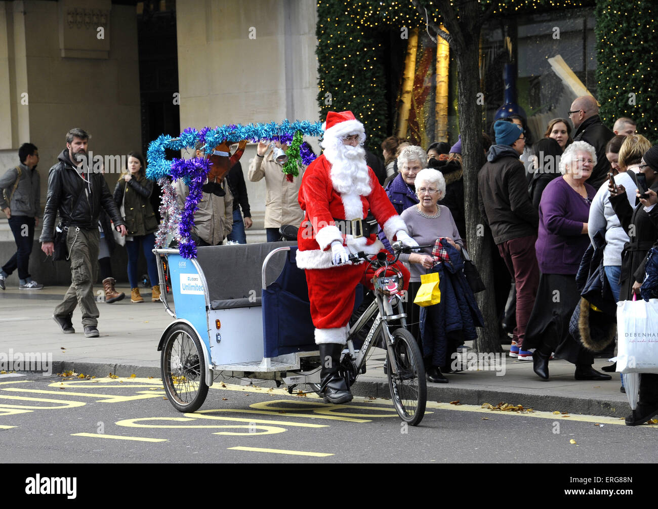 A London Pedicab driver gets into the festive spirit as he pedaled ...