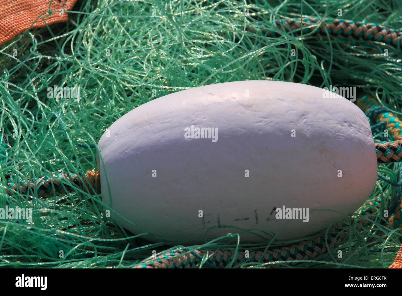 Fishing Buoy and Fish Netting Stock Photo - Alamy