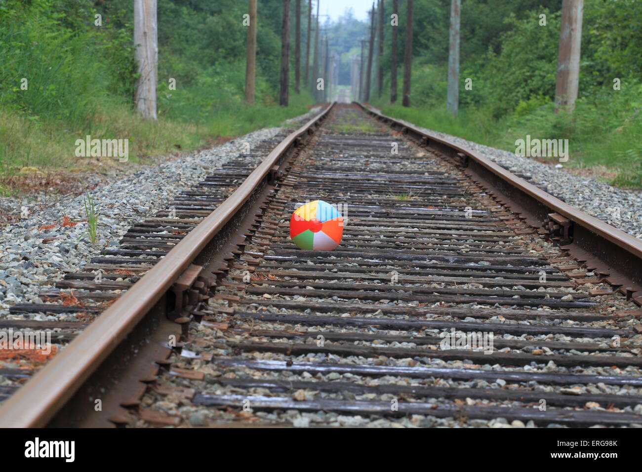 A colorful Beach Ball on Railway Tracks Stock Photo - Alamy