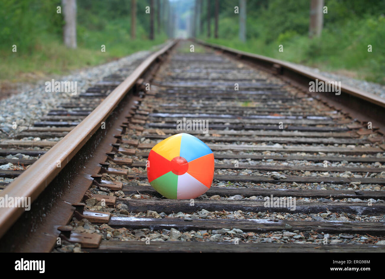 A colorful Beach Ball on Railway Tracks Stock Photo - Alamy