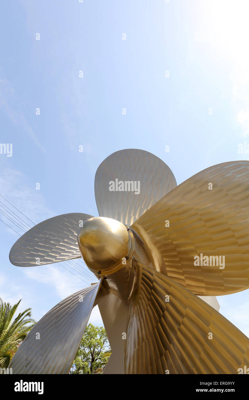 Brass ship screw against a blue sky Stock Photo - Alamy