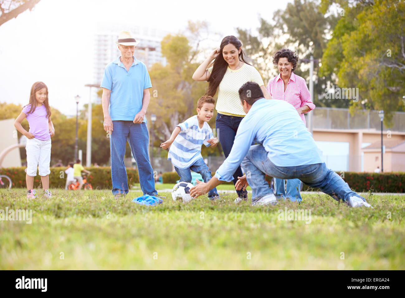 Multi Generation Family Playing Soccer Together Stock Photo - Alamy