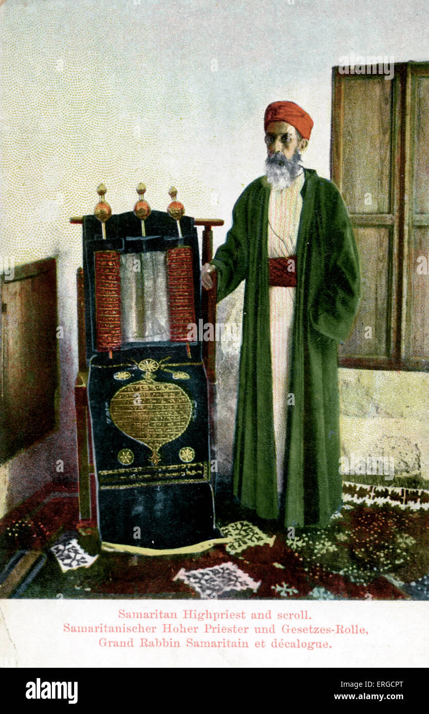 Samaritan priest from Nablus community standing next to scrolls of the ...