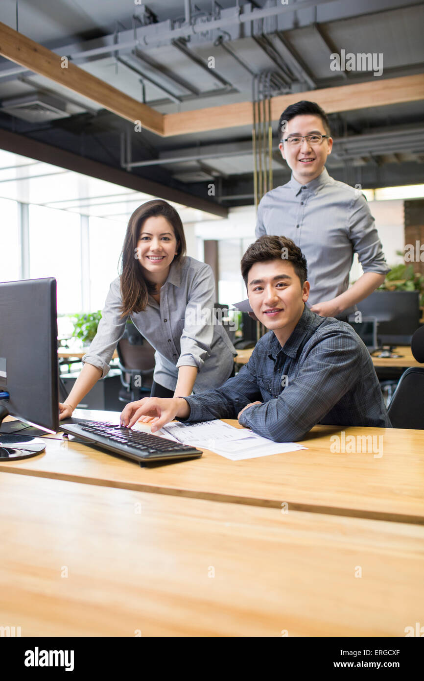 IT workers working in office Stock Photo - Alamy