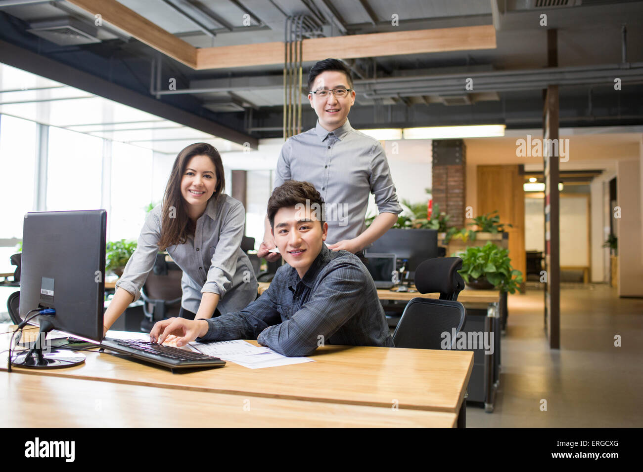 IT workers working in office Stock Photo - Alamy