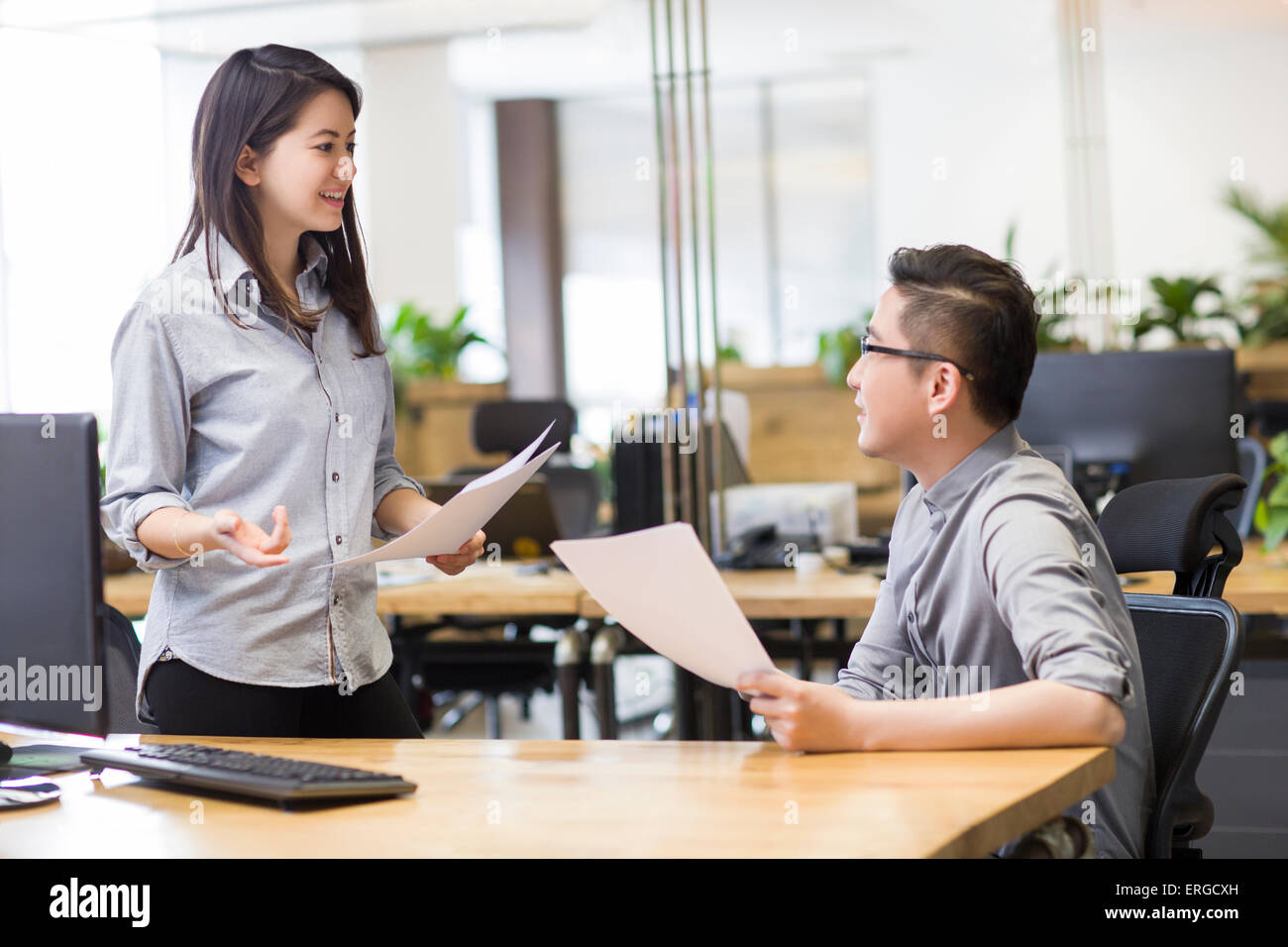 Sitting communication gesturing looking away place of work paper hi-res ...