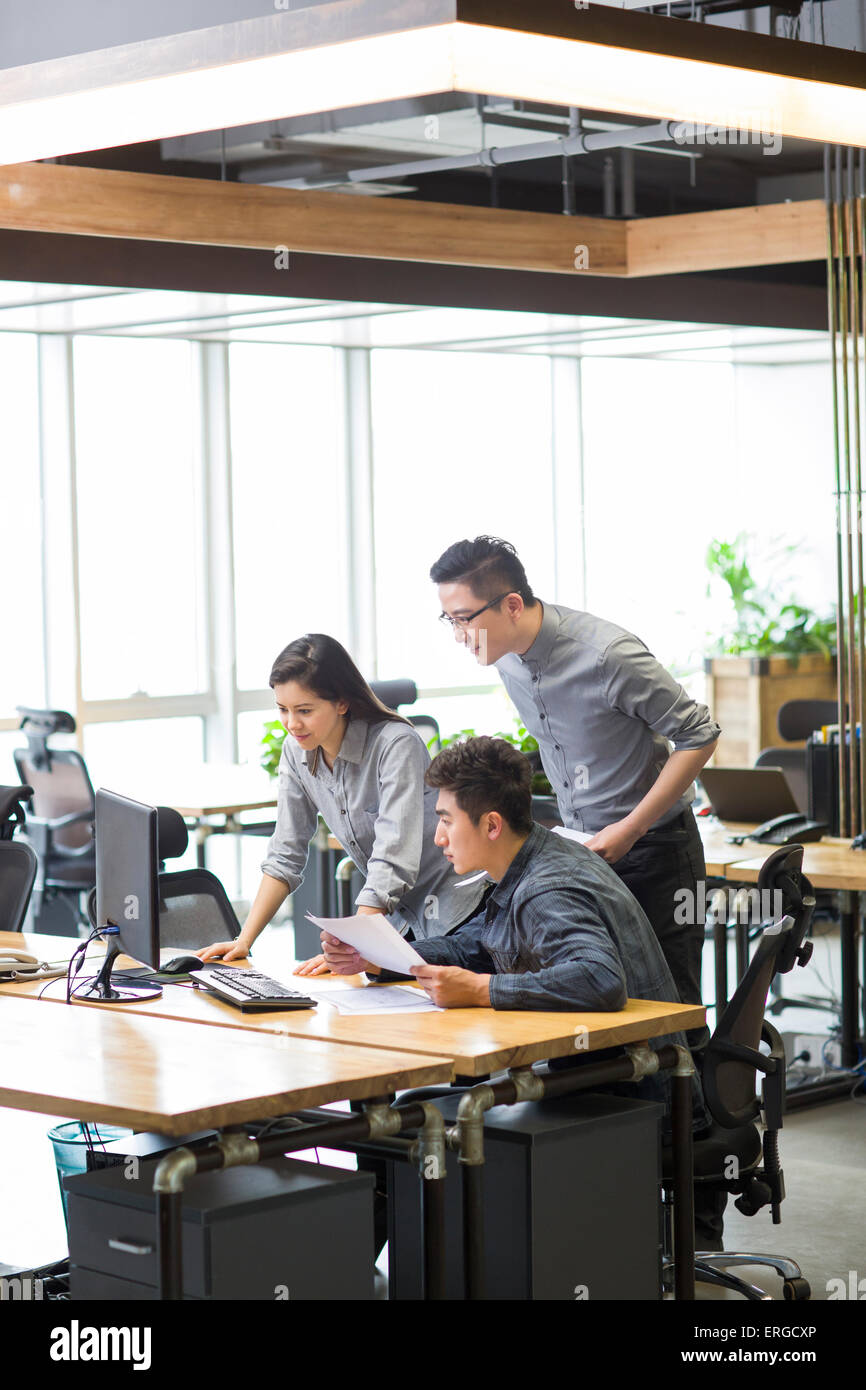 IT workers working in office Stock Photo - Alamy