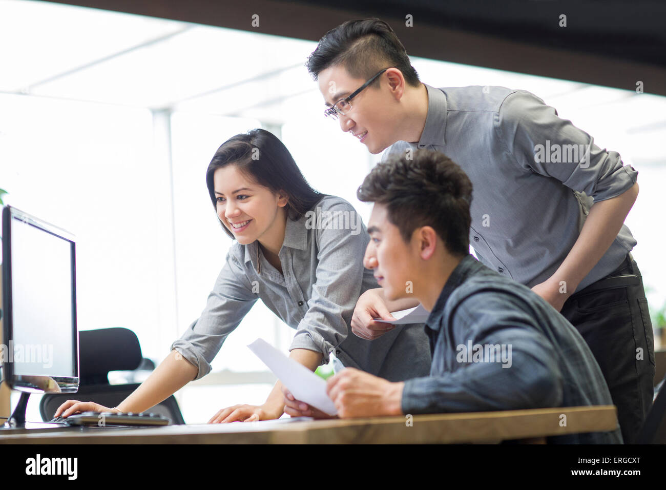IT workers working in office Stock Photo - Alamy