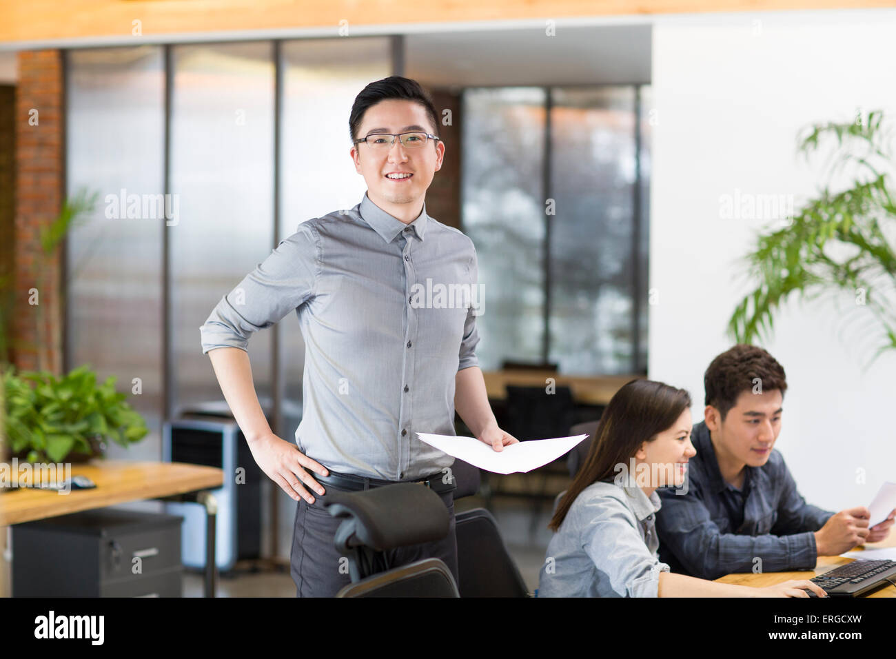 IT workers working in office Stock Photo - Alamy