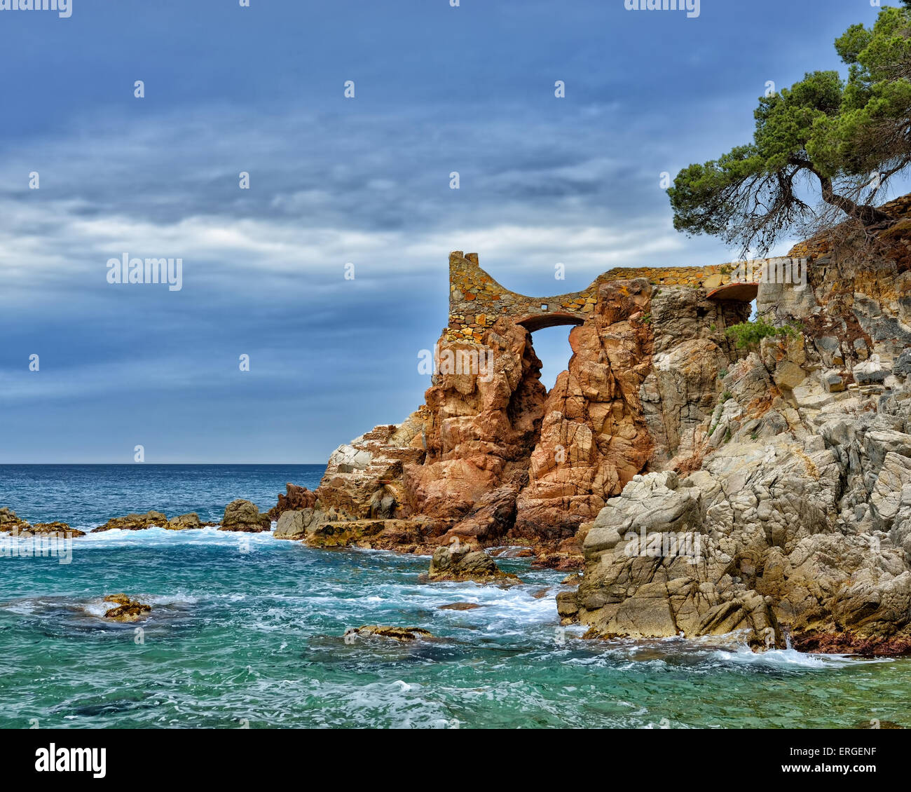 Beautiful rocks of Costa Brava with pine trees and cloudy sky Stock ...
