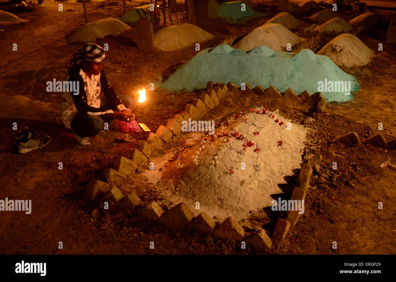 Muslim graveyard praying hi-res stock photography and images - Alamy