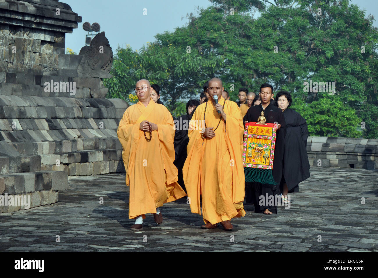 Buddhist monks pray at Borobudur temple in on June 2, 2015 in Magelang ...