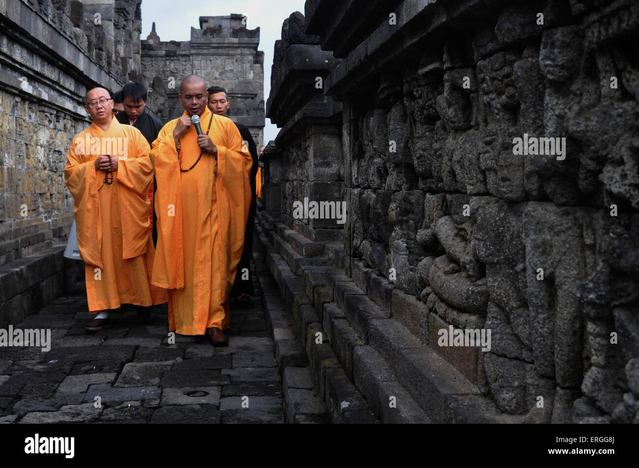Buddhist monks pray at Borobudur temple in on June 2, 2015 in Magelang ...