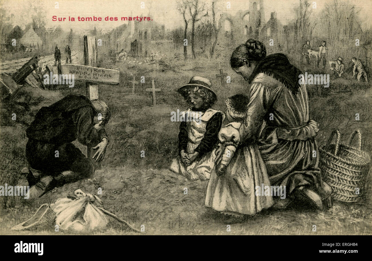 World War 1:Belgian Family mourning a soldier at his grave. Belgian ...
