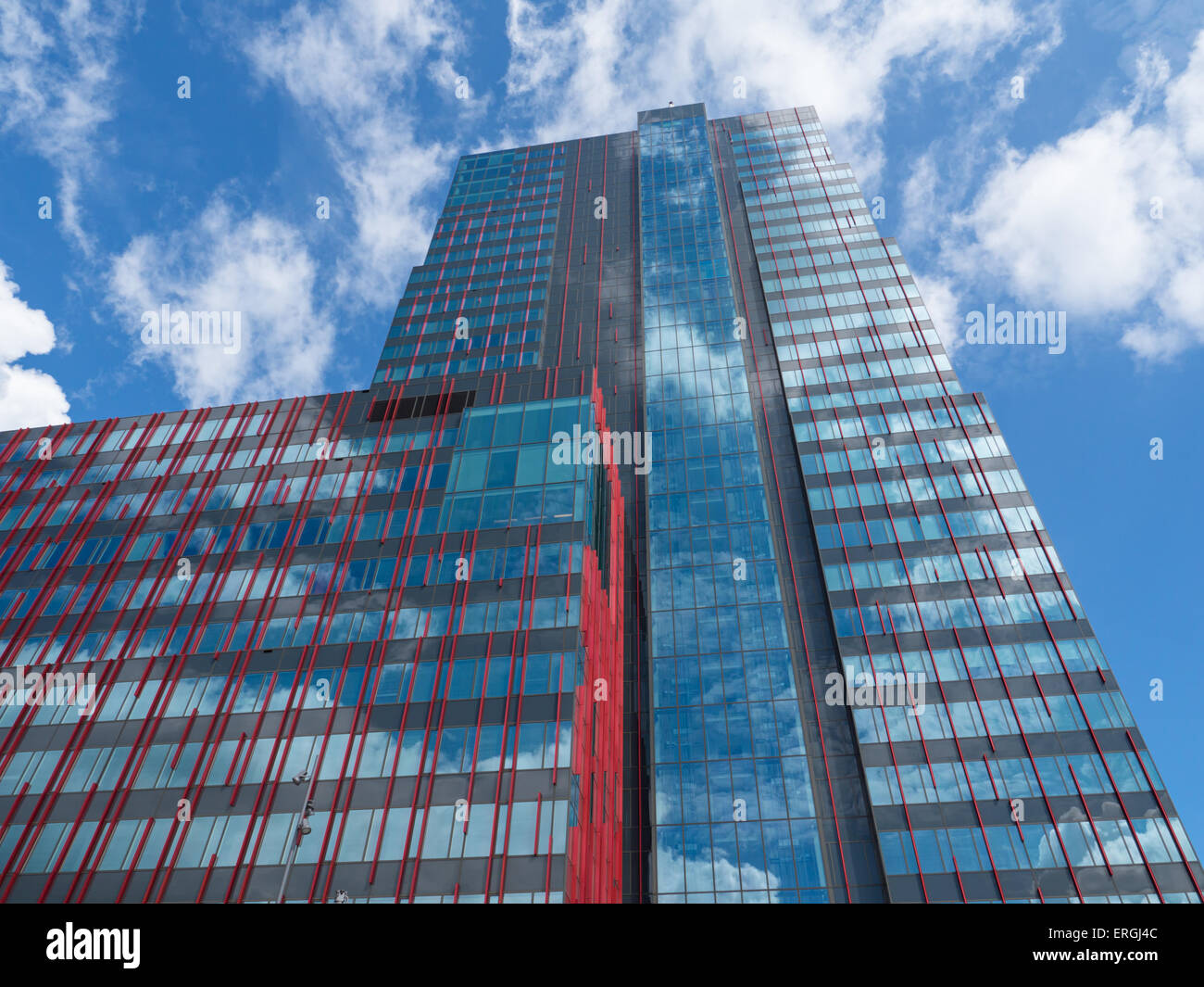 Glass high-rise building in the modern city centre of Almere, The ...