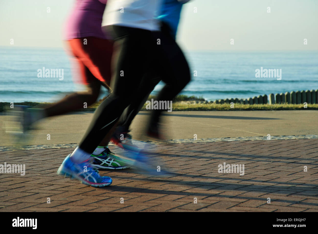 Motion blur scene Moving legs and feet of people running for exercise ...