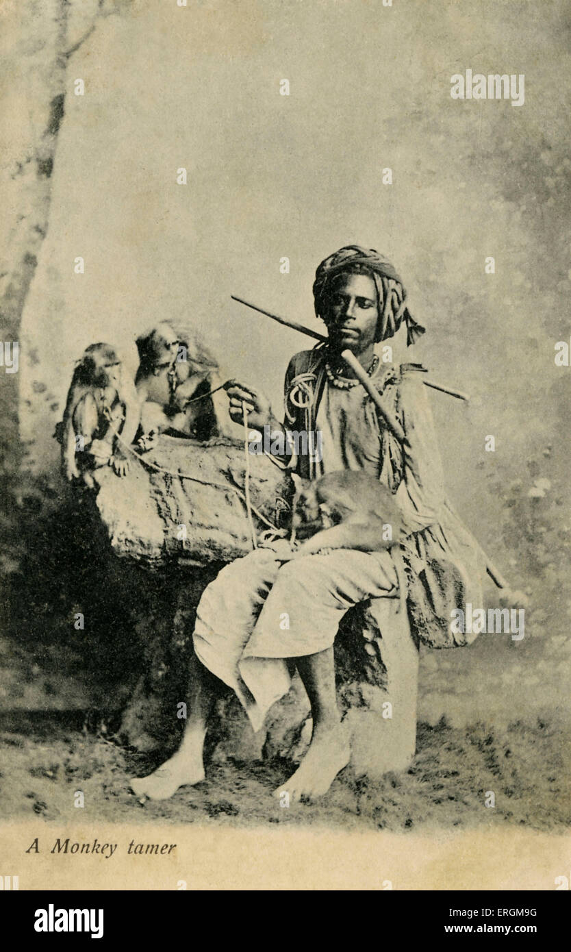 An Indian Monkey Tamer and monkies. Photograph from early 20th century ...