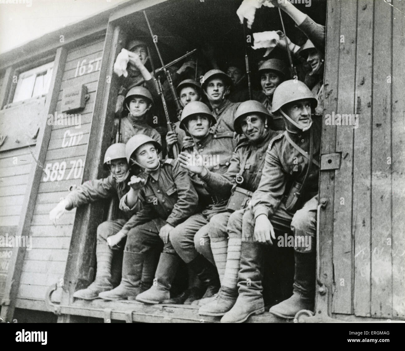 Russian soldiers waving from onboard a train during the Second World ...