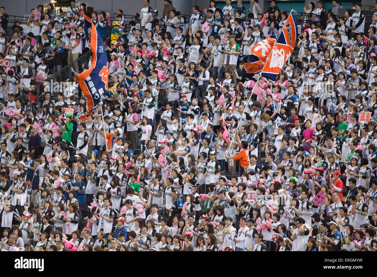 A giant crowd of people at the Sapporo Dome in Sapporo, Hokkaido gather ...