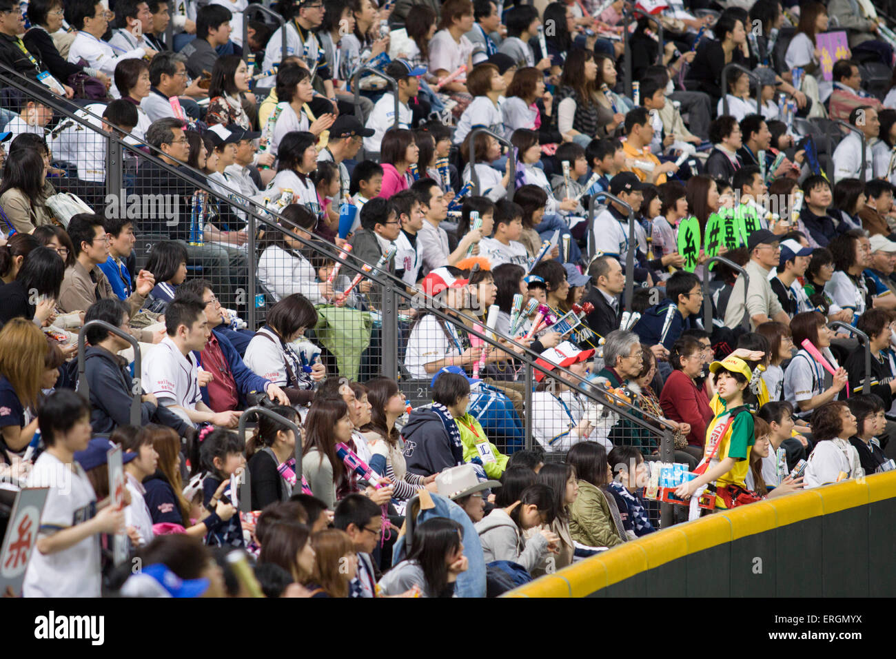 A giant crowd of people at the Sapporo Dome in Sapporo, Hokkaido gather ...