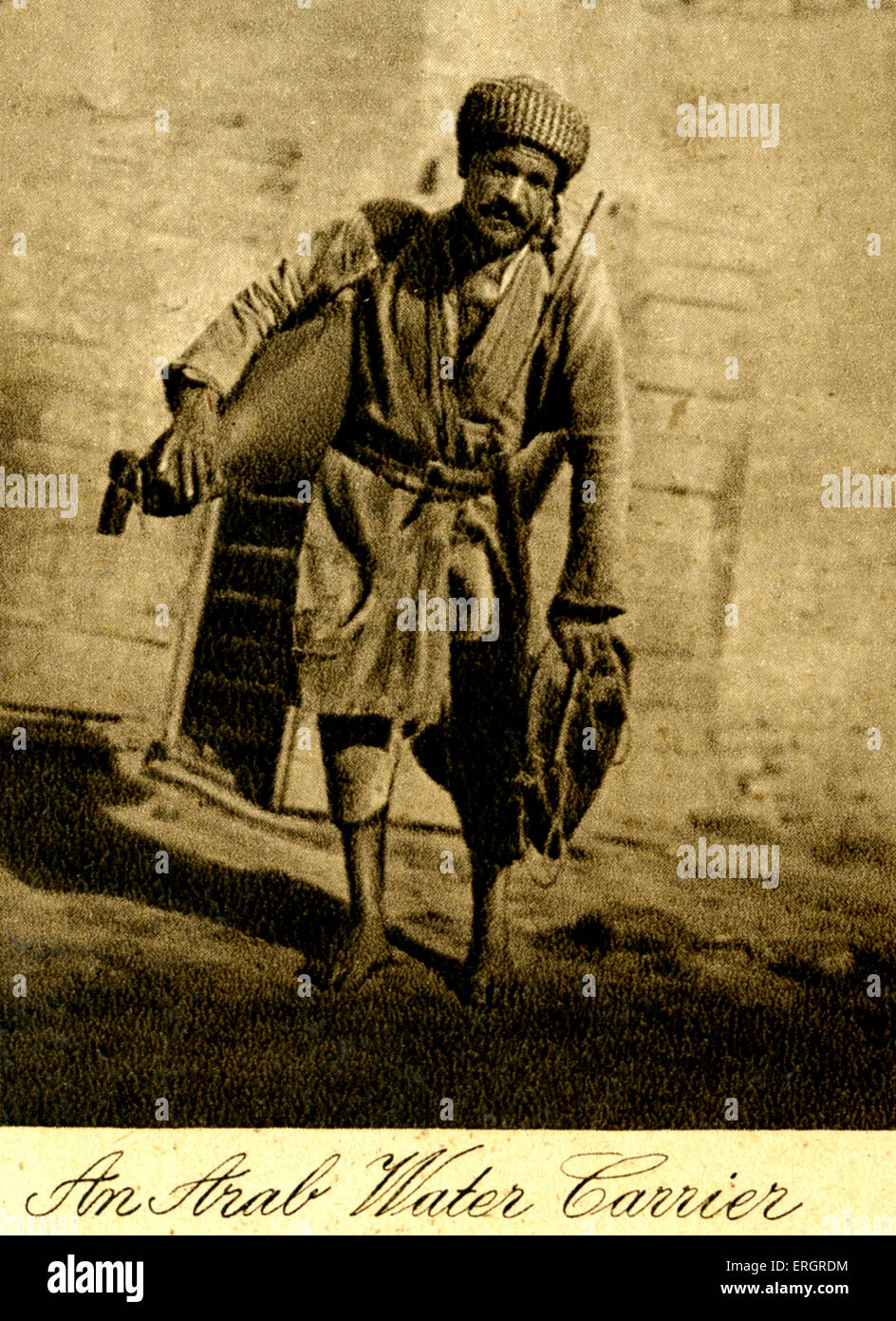 Iraq - An Arab Water Carrier. Photo taken in 1920s after creation of ...