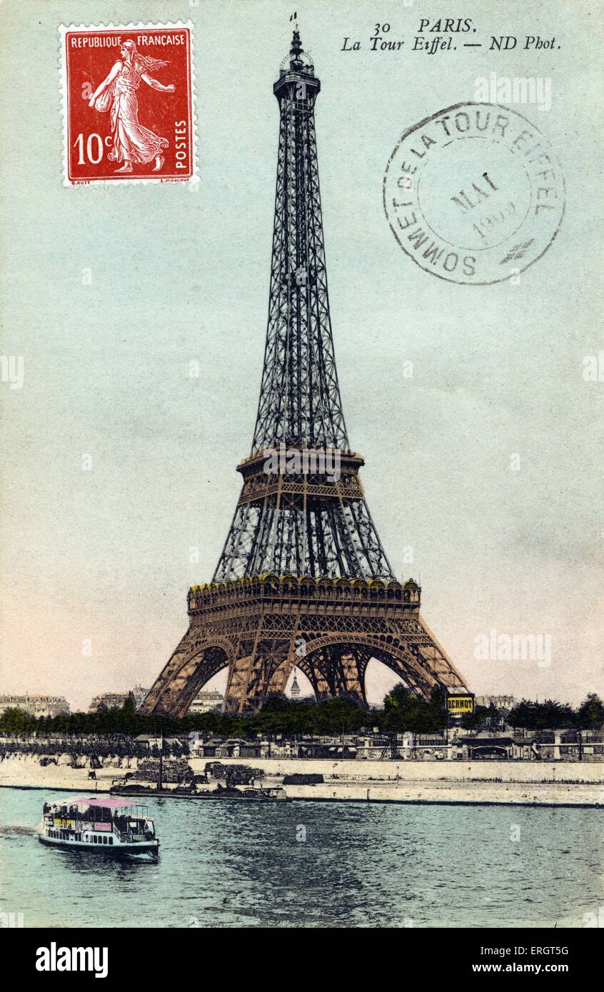 The Eiffel Tower next to the Seine in Paris. Stamp with 1909 postmark ...