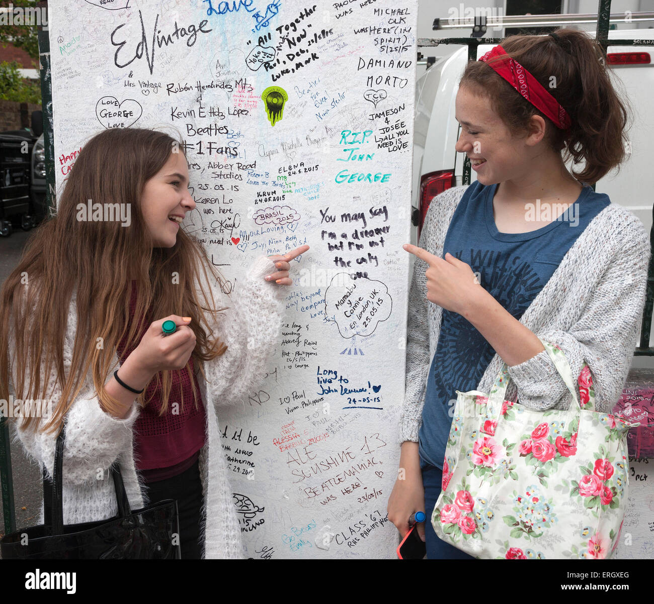 Beatles fans writing on wall at Abbey Road studios Stock Photo - Alamy