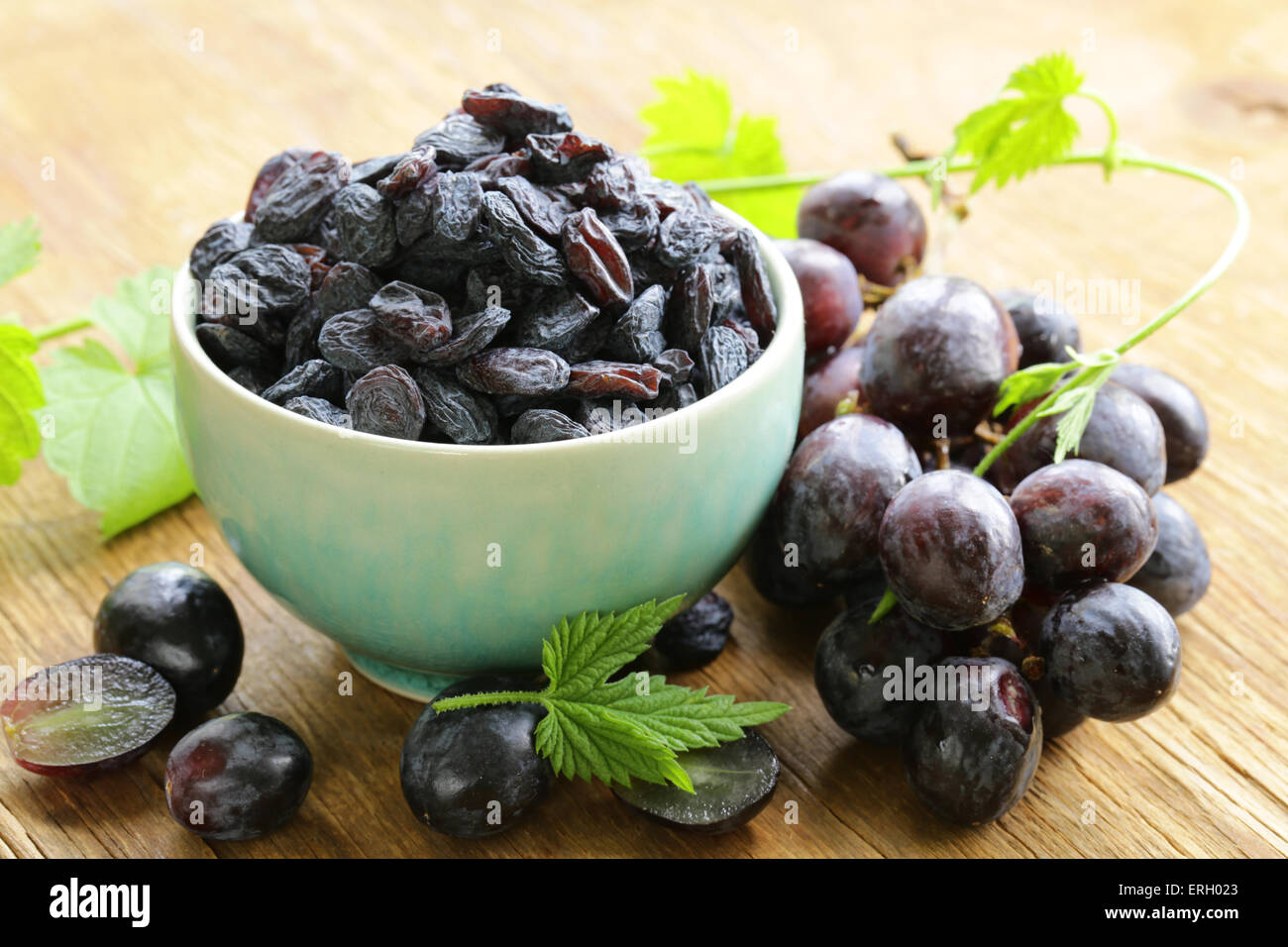 Natural organic dried grapes raisins, rustic still life Stock Photo - Alamy