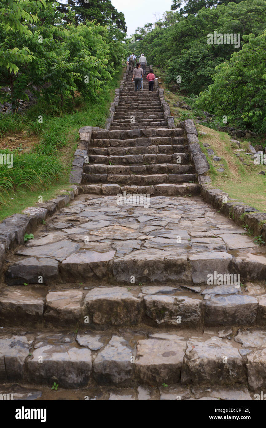 A stone pathway inside Nakijin Castle, a 14th Century castle in Okinawa ...