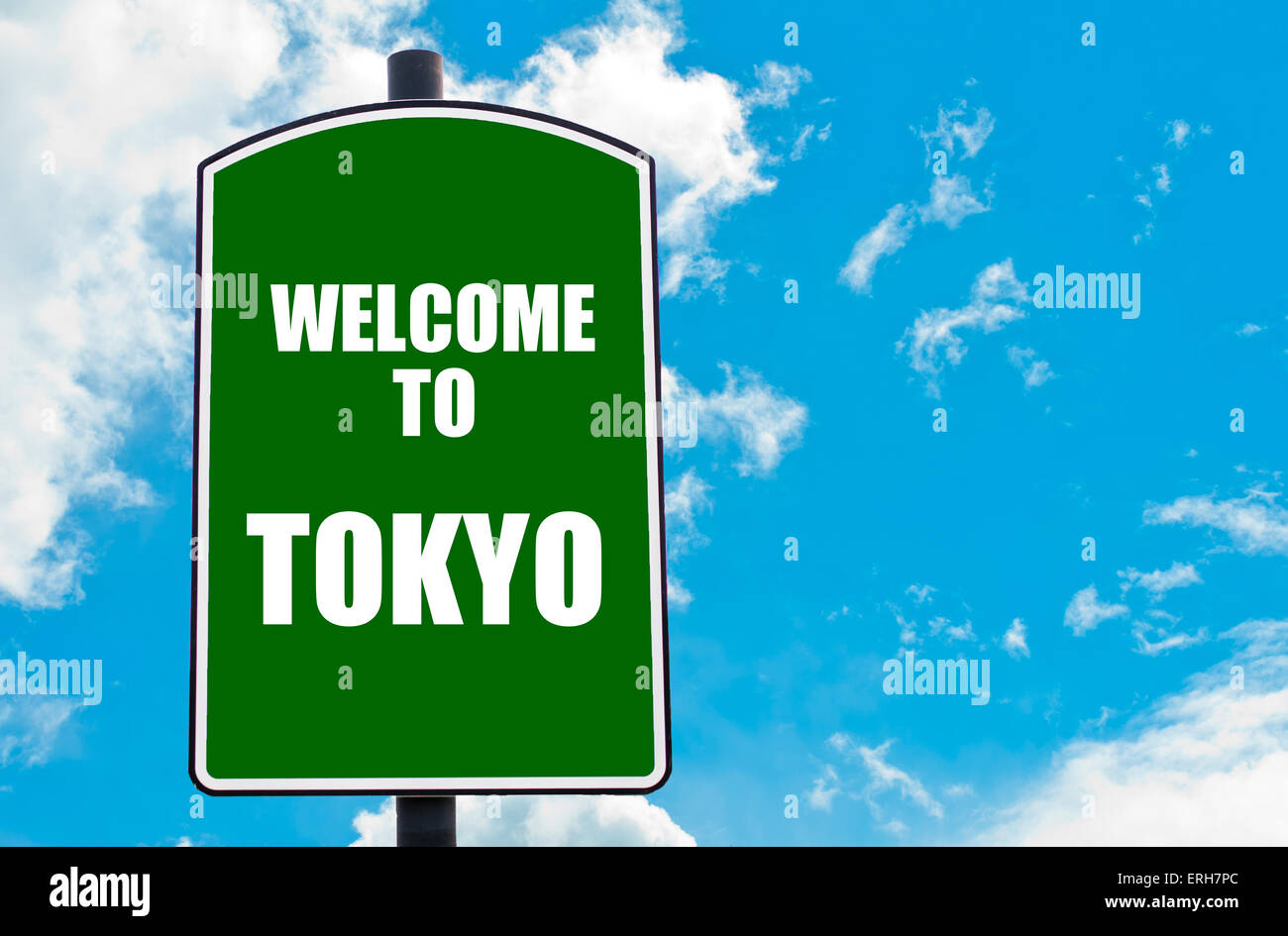 Green road sign with greeting message Welcome to TOKYO isolated over ...