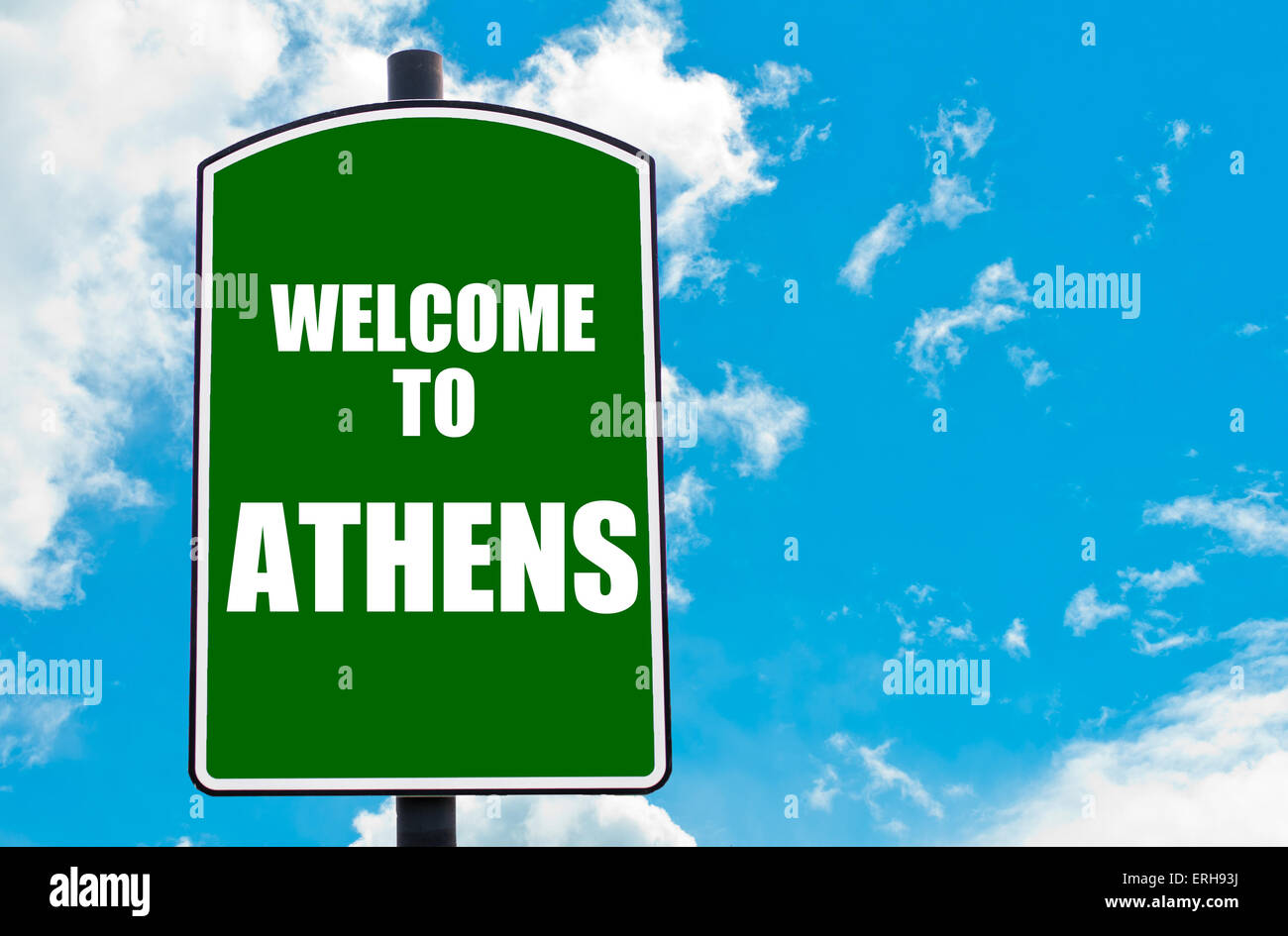 Green road sign with greeting message Welcome to ATHENS isolated over ...