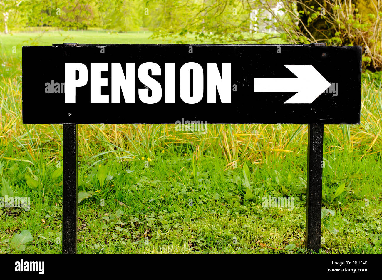 PENSION written on directional black metal sign with arrow pointing to ...