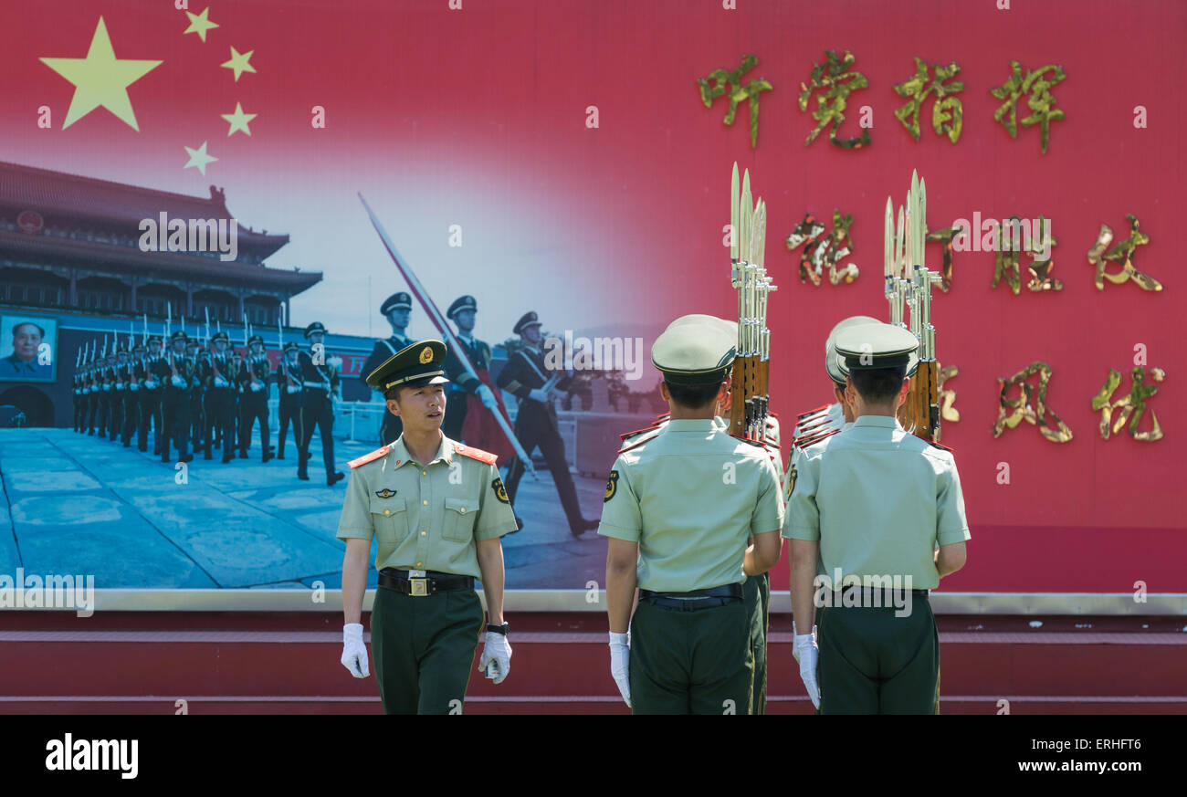 Guards standing at attention in the Forbidden City, Beijing, China ...