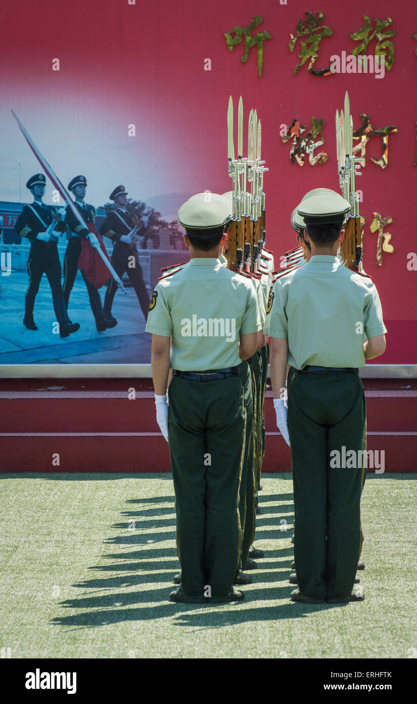Guards standing at attention in the Forbidden City, Beijing, China ...