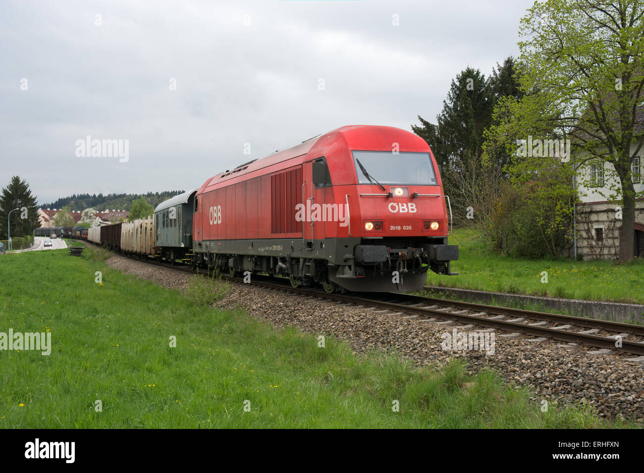An Austrian Federal railways OBB mixed freight train heads along a ...