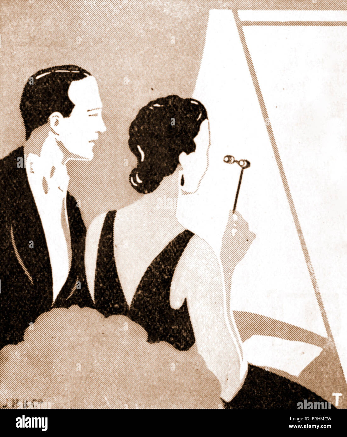 Theatre audience - elegant couple at a theatre performance, woman ...